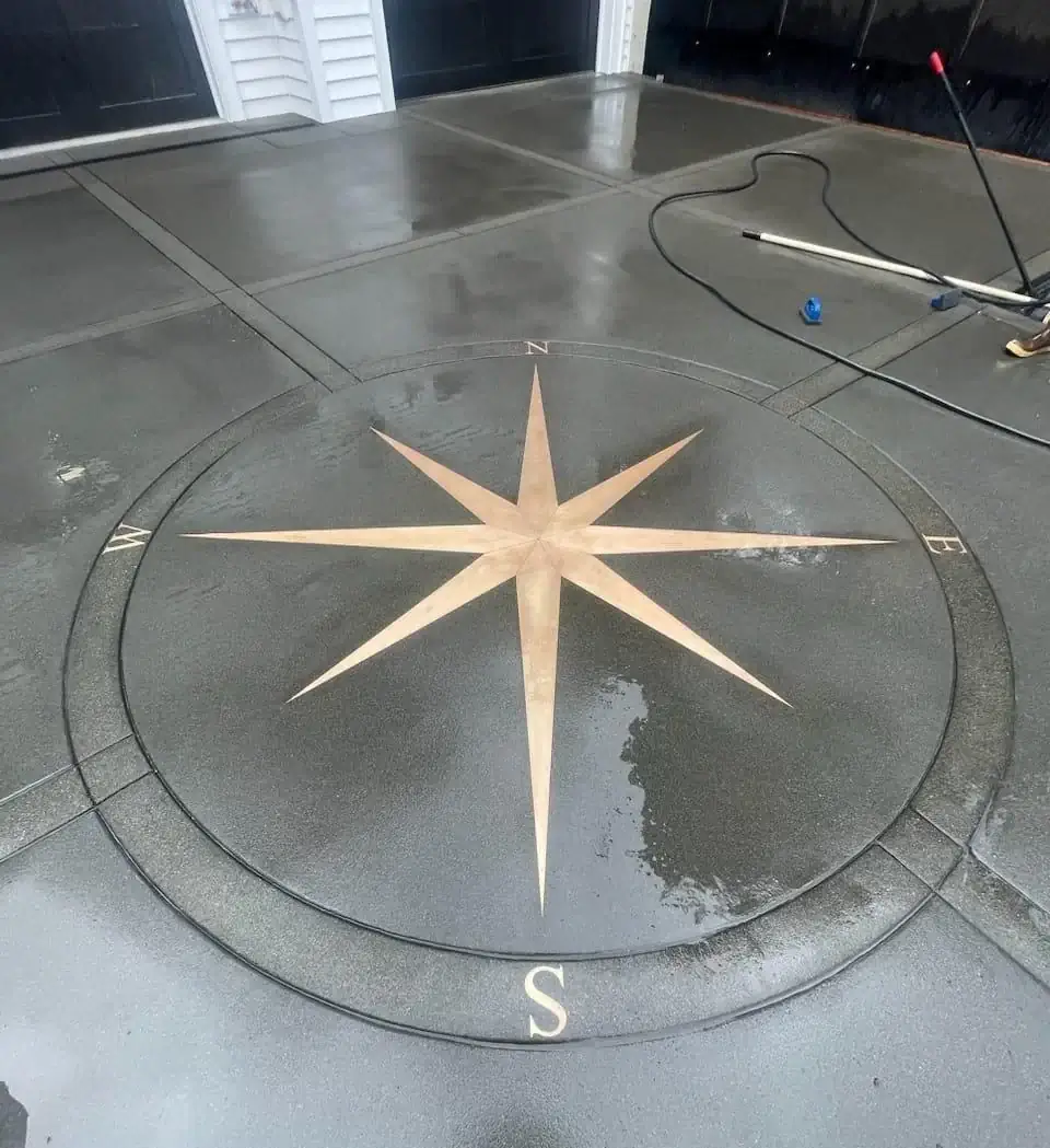 Sand Finish Concrete Driveway with Custom Stained Compass Inlay in ...